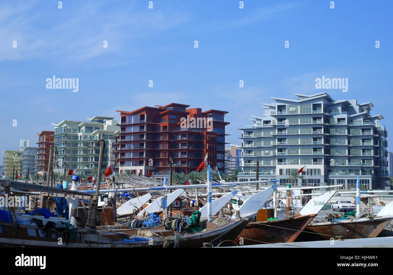 Reef Island housing development, with fishing dhows in front, Manama ...
