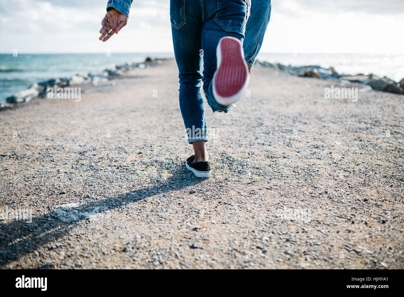 Man running on jetty hi-res stock photography and images - Alamy