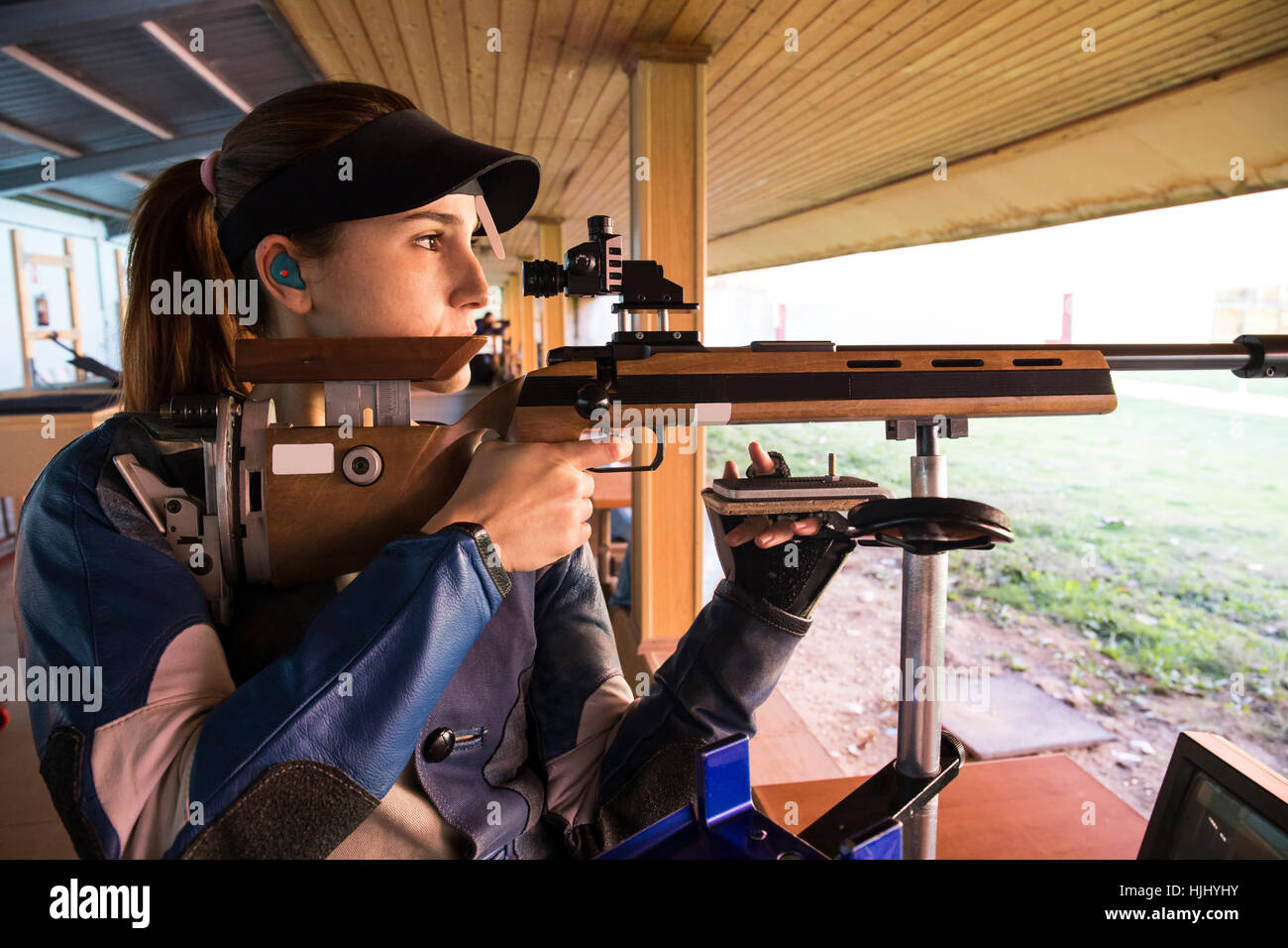 Woman sporting rifle in hi-res stock photography and images - Alamy