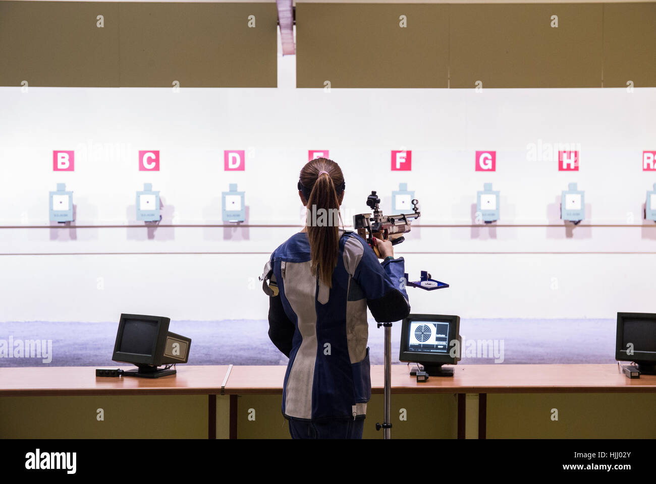 Woman shooting targets hi-res stock photography and images - Alamy