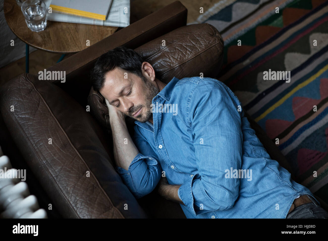 Mature man taking nap hi-res stock photography and images - Alamy