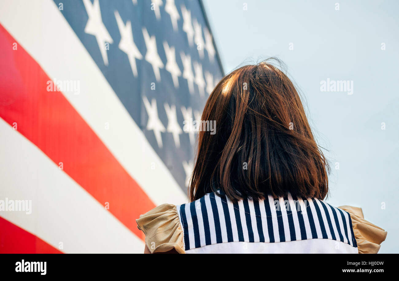 USA, back view of woman in front of Stars And Stripes Stock Photo - Alamy