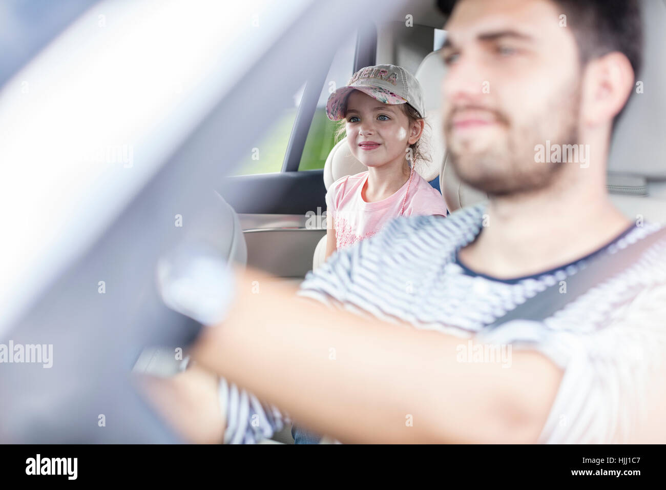 Father and daughter driving in car Stock Photo - Alamy