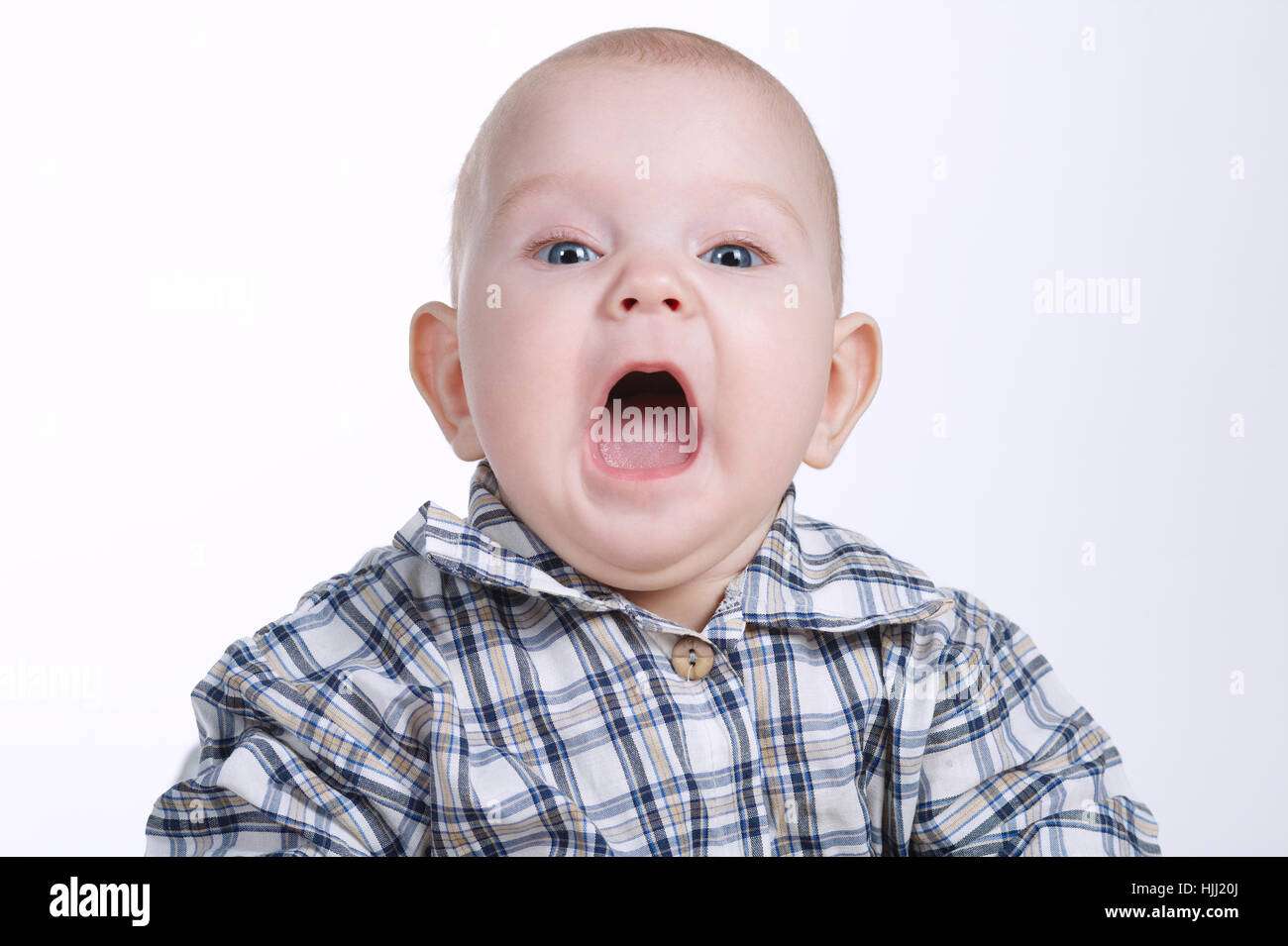 portrait of little confused baby Stock Photo - Alamy