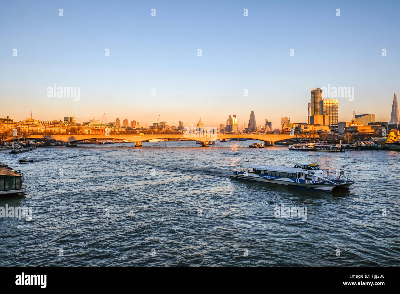 London skyline shot on a bright sunny winter's day. River view with ...
