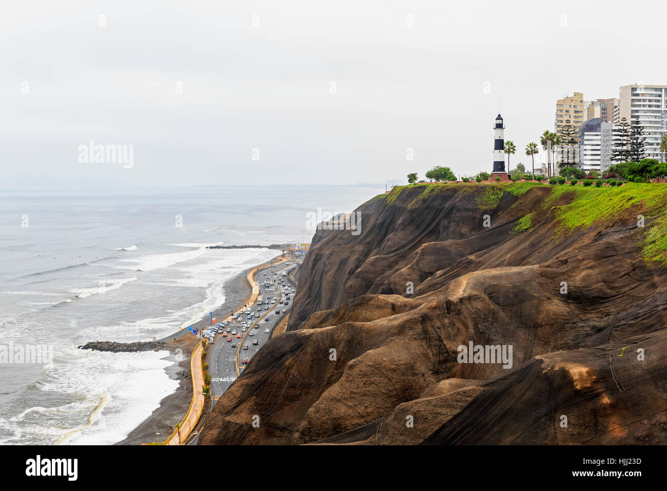 Peru, Lima, Miraflores, steep coast, lighthouse and buildings Stock ...