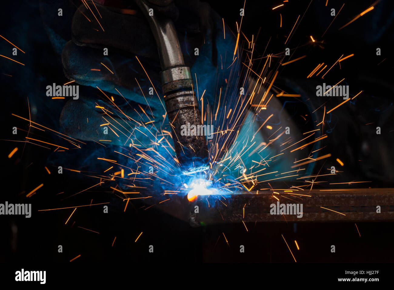 Close-up of welder at work Stock Photo - Alamy
