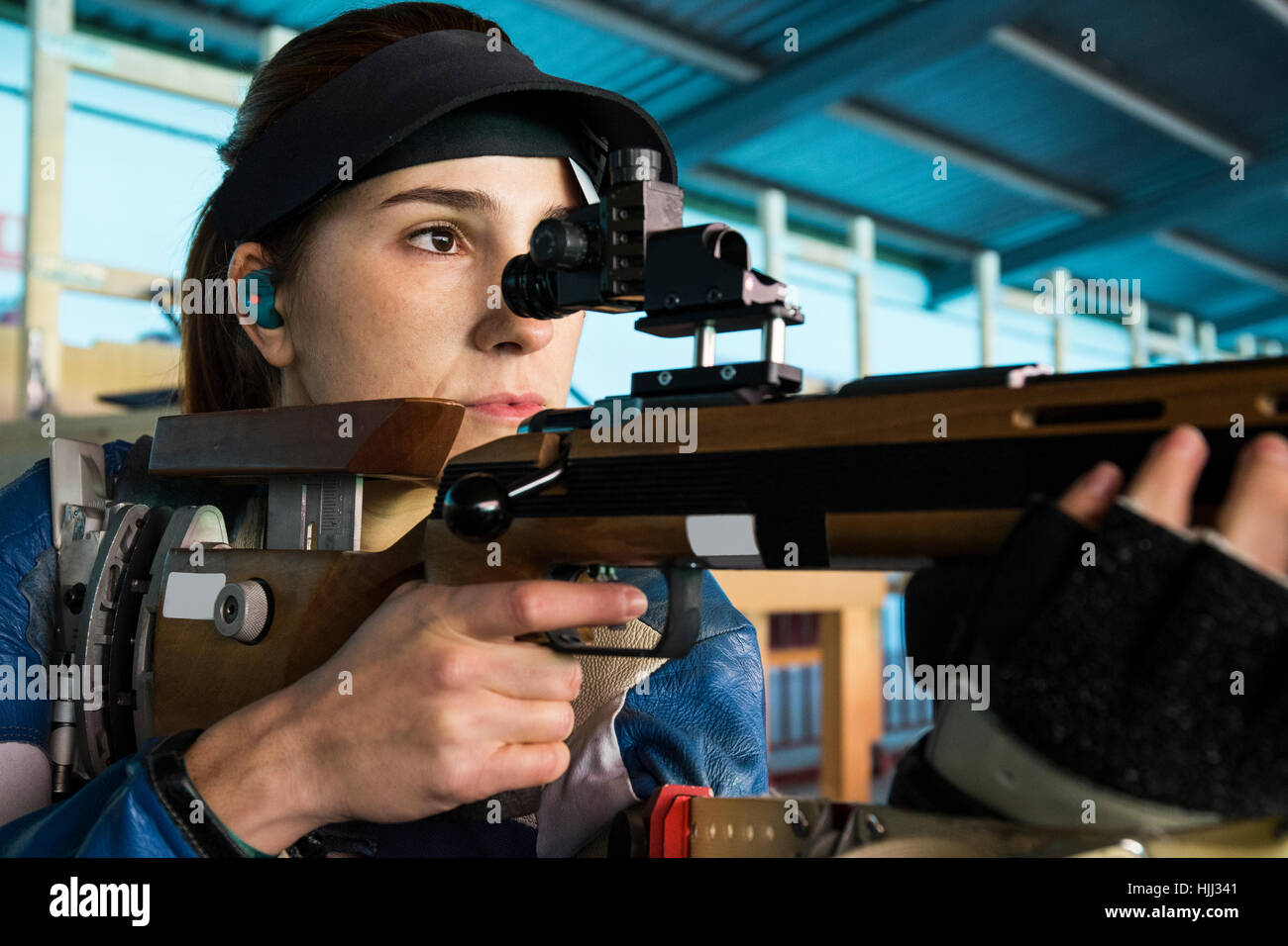 Woman sporting rifle aiming hi-res stock photography and images - Alamy
