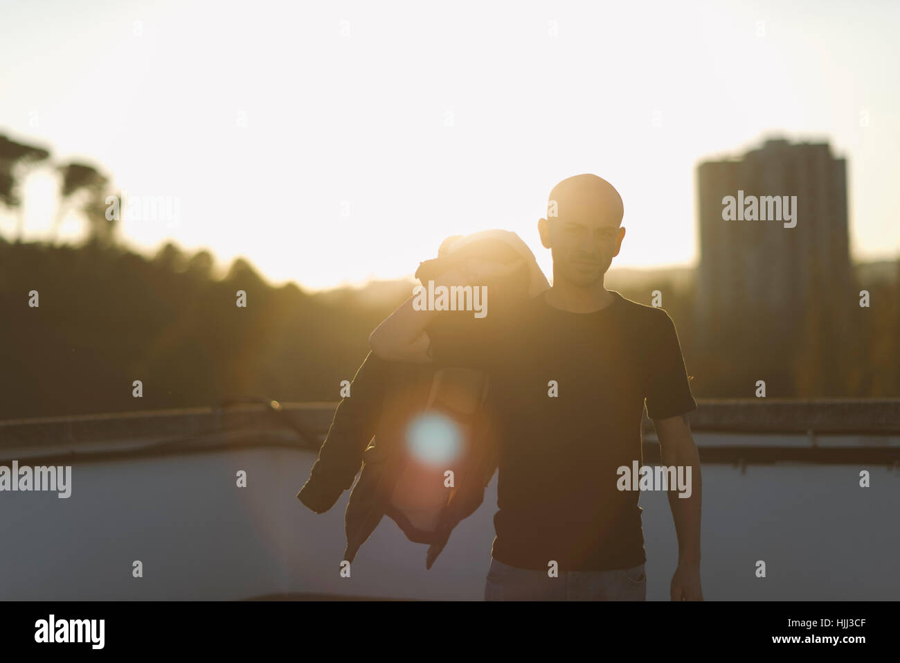 Man standing on roof beam hi-res stock photography and images - Alamy
