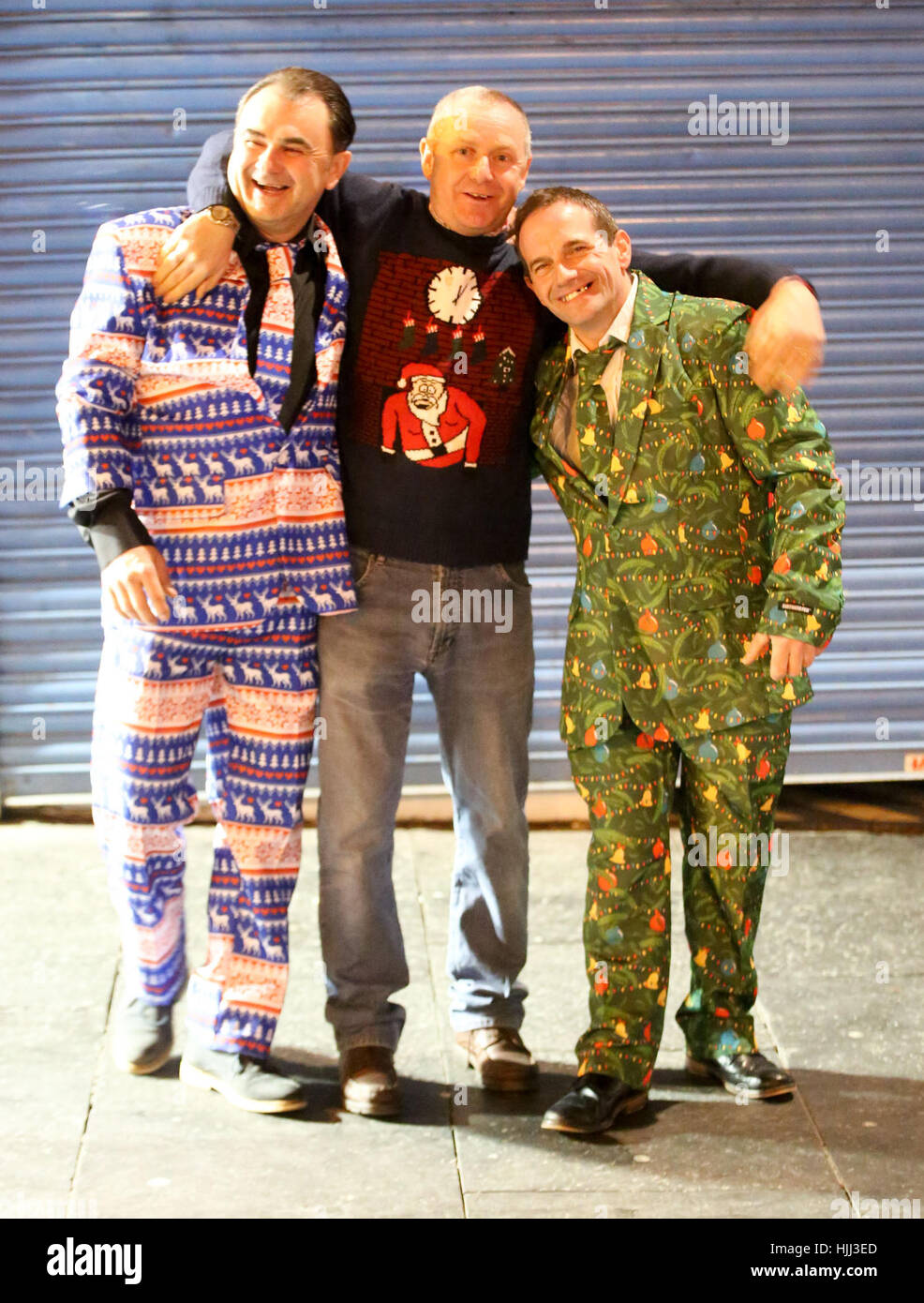 Christmas revellers festive spirit enjoy hi-res stock photography and ...