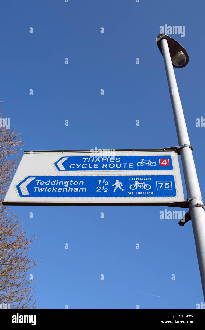 signs for the thames cycle route and london cycle network with ...