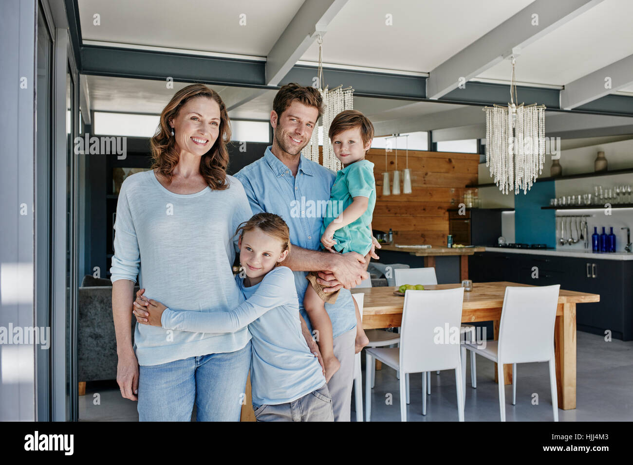Happy family at home Stock Photo - Alamy