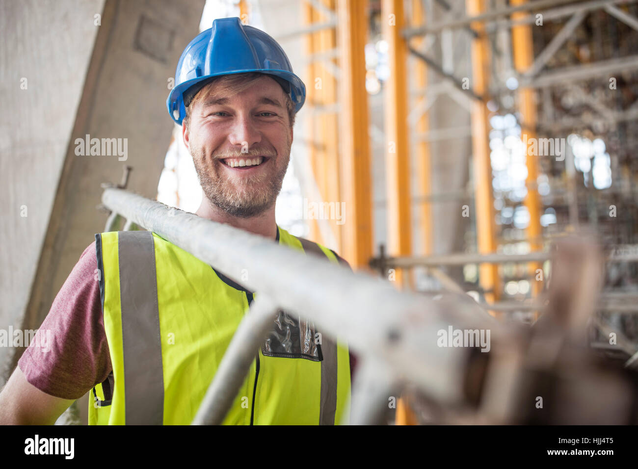Construction worker carrying ladder hi-res stock photography and images ...