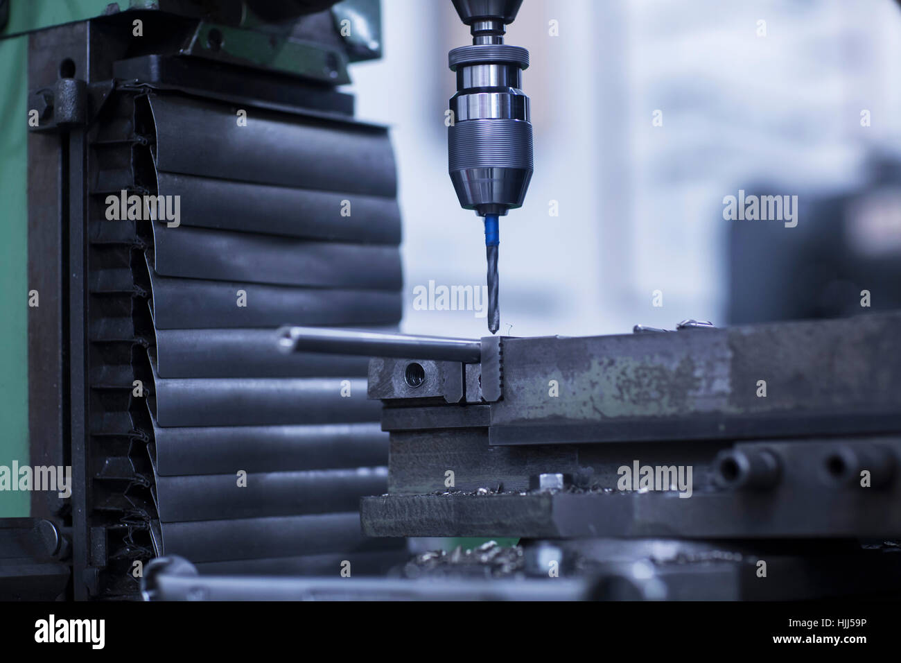 Drill press in a factory Stock Photo - Alamy