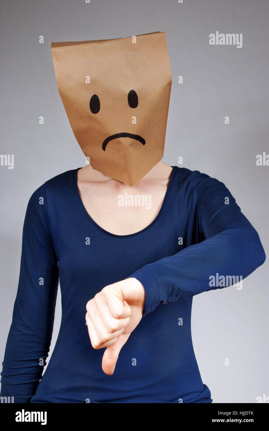 a person symbolizes sadness or something mad, gray background Stock ...