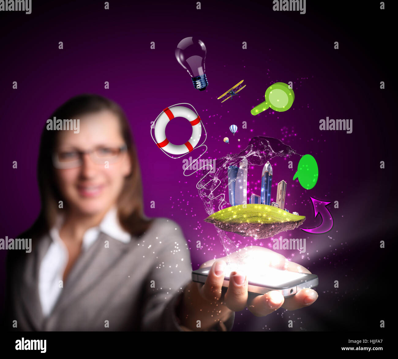 Business woman holding a mobile phone sending images hi-res stock ...