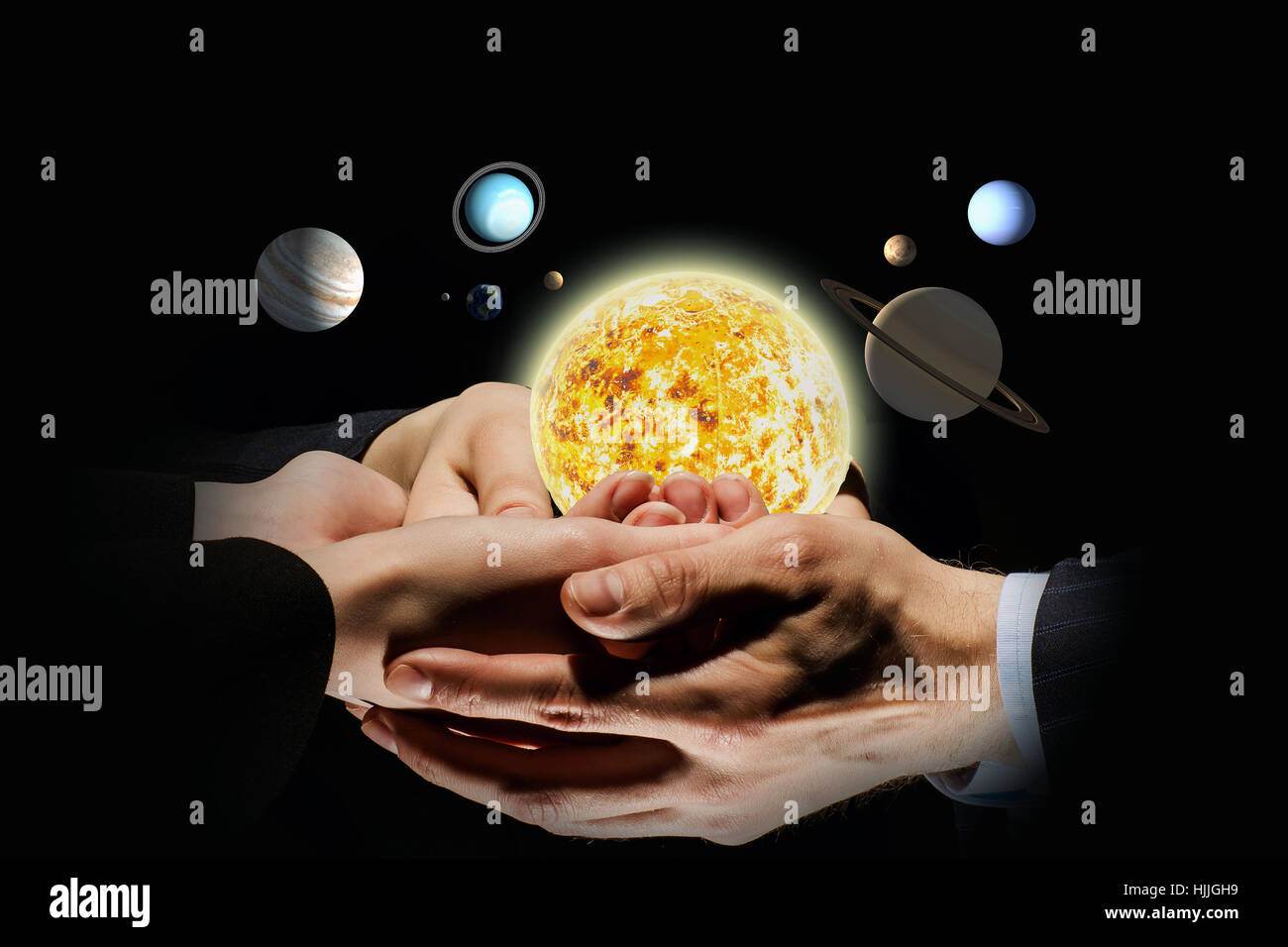 Close up of planet sun system in your hand Stock Photo - Alamy