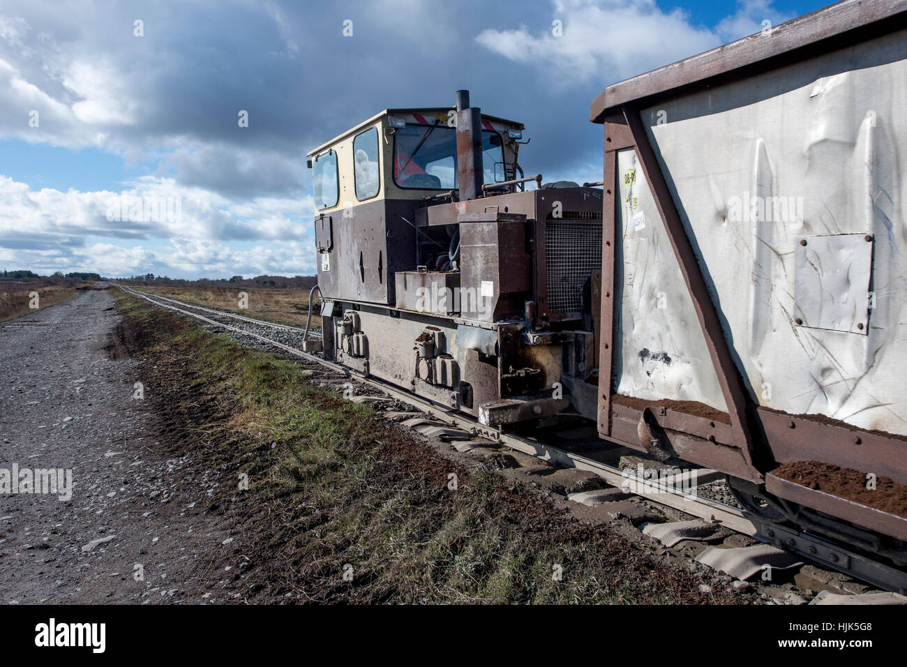 Bog train of West Offaly Railway filled with peat on the way to power ...