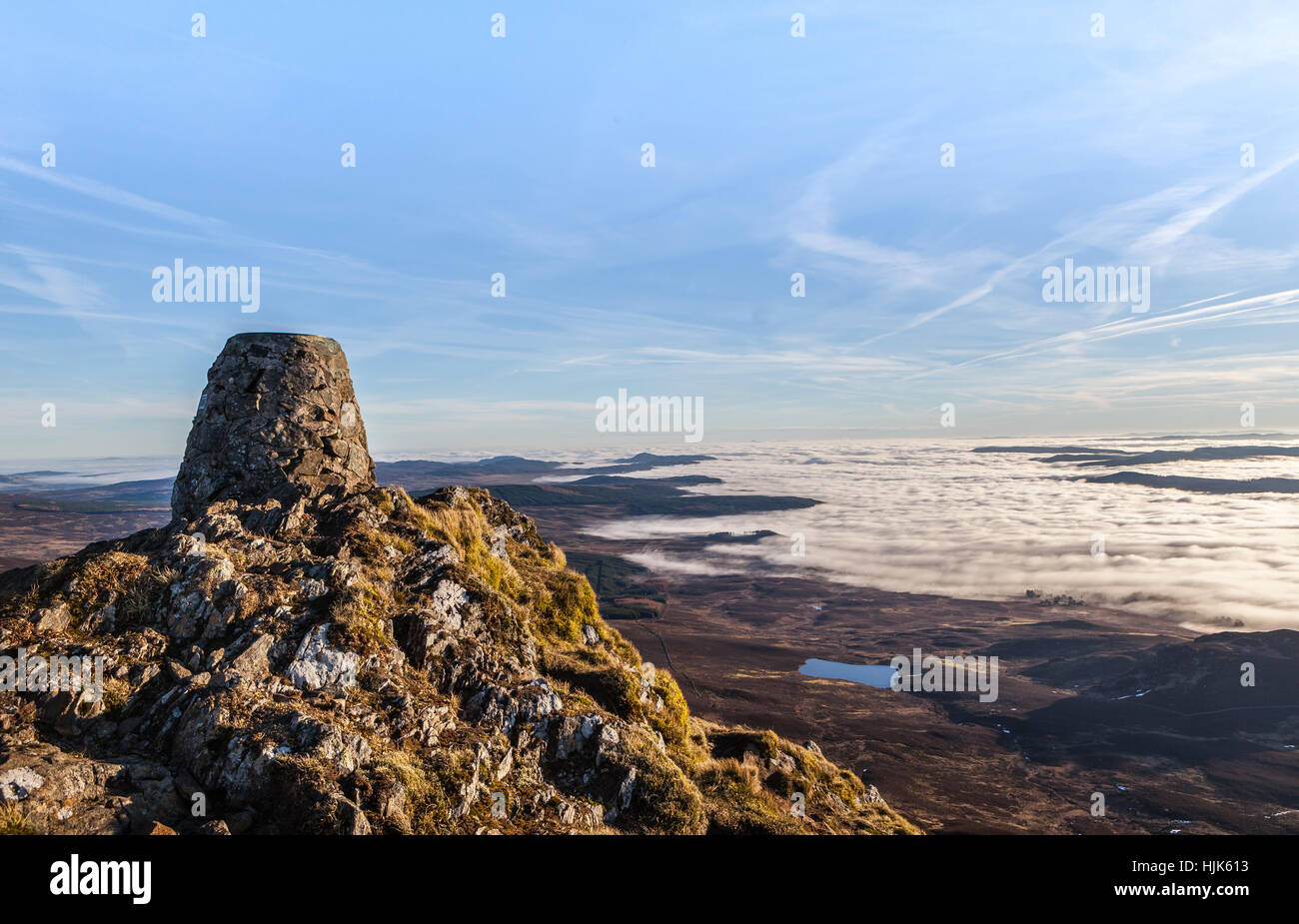 The trig point at the summit of the mountain of Ben Vrackie near ...