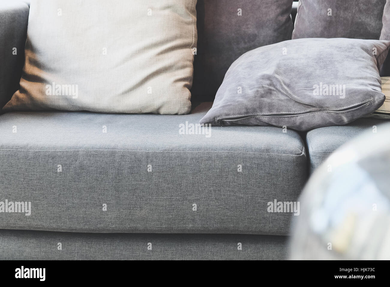 detail image of cushion on sofa, modern living room, home interior ...