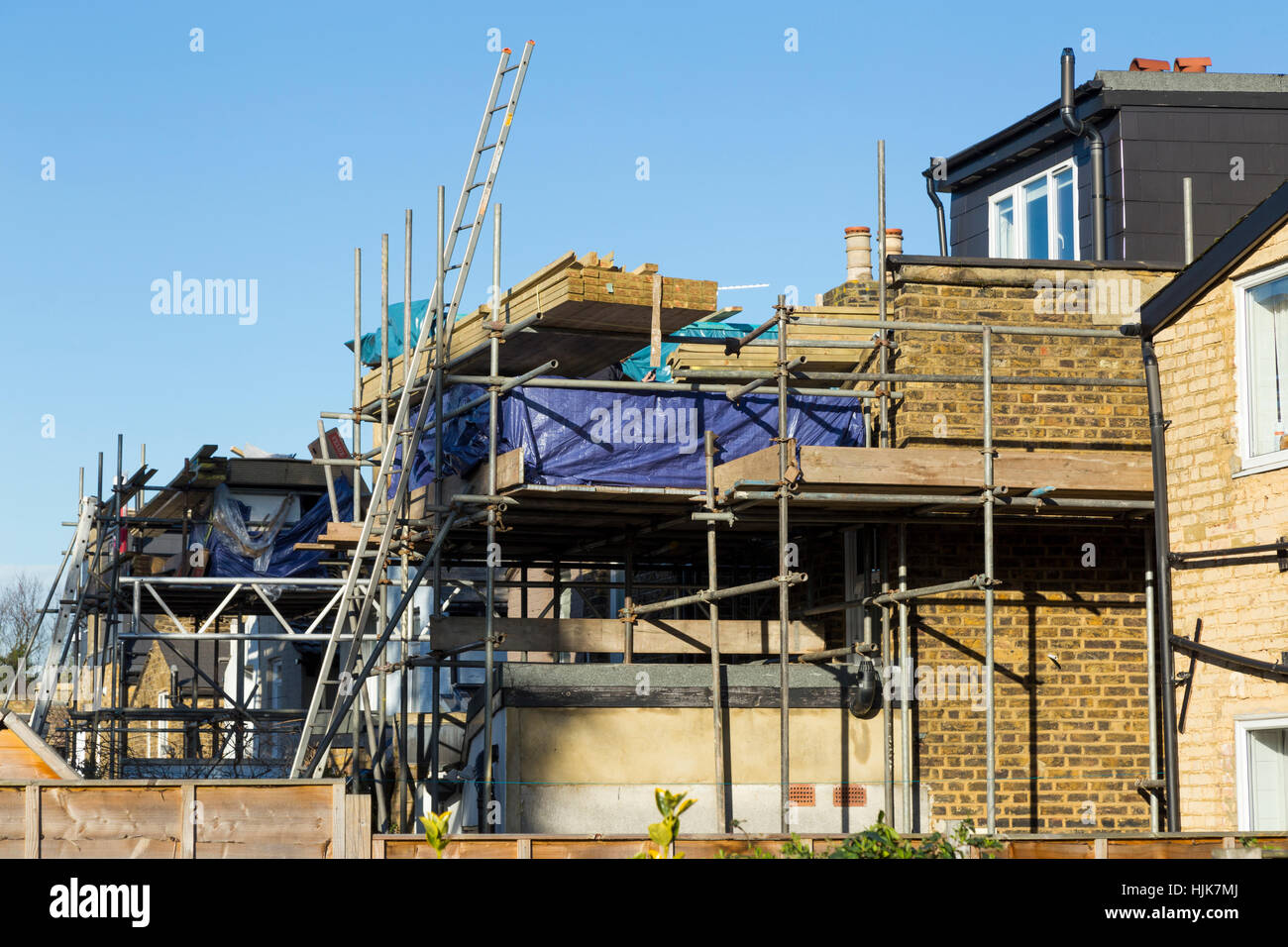 Scaffolding to a two new dormer / dormers / dormas / dorm on the roof ...