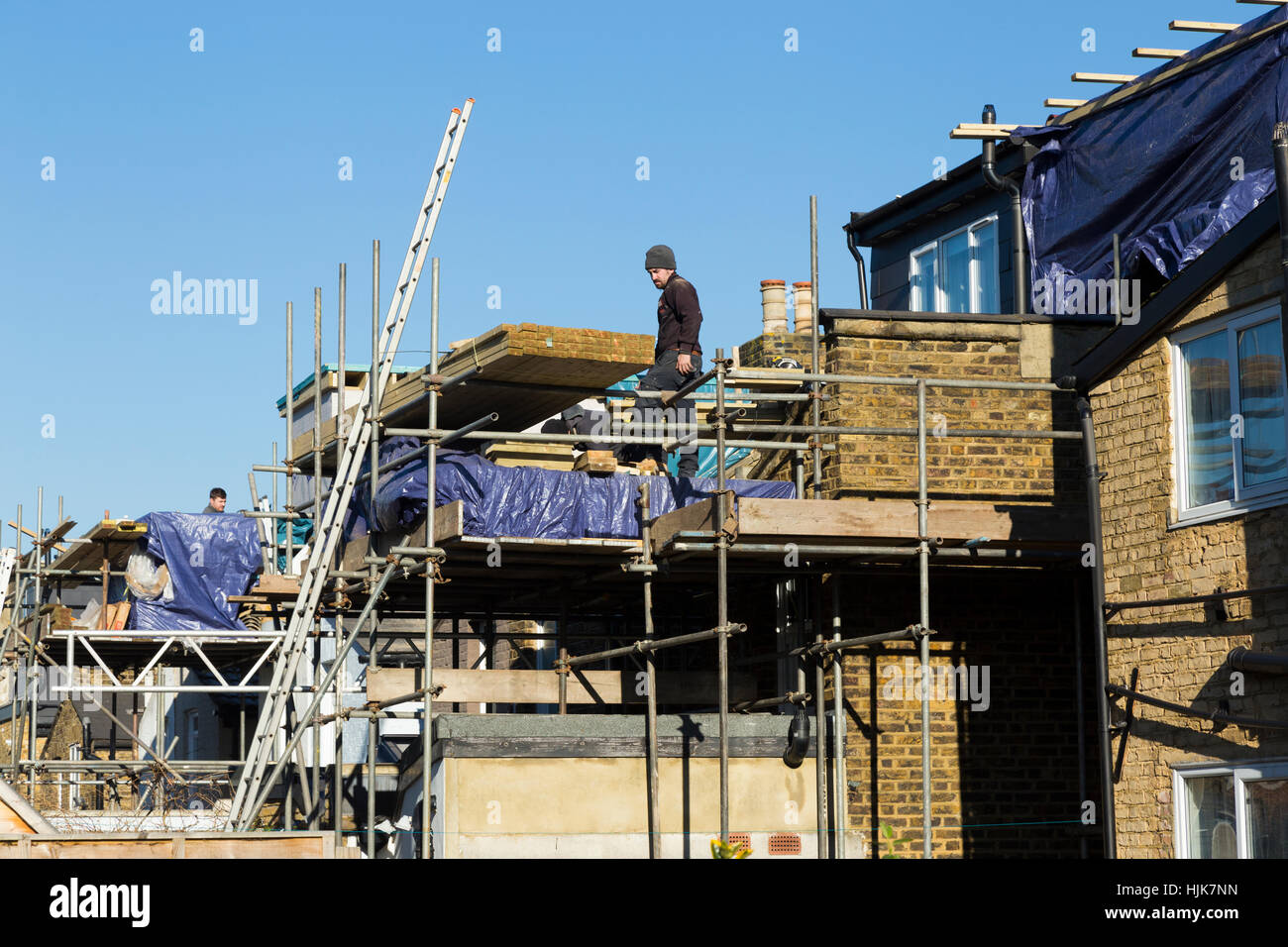 Scaffolding to a two new dormer / dormers / dormas / dorm on the roof ...
