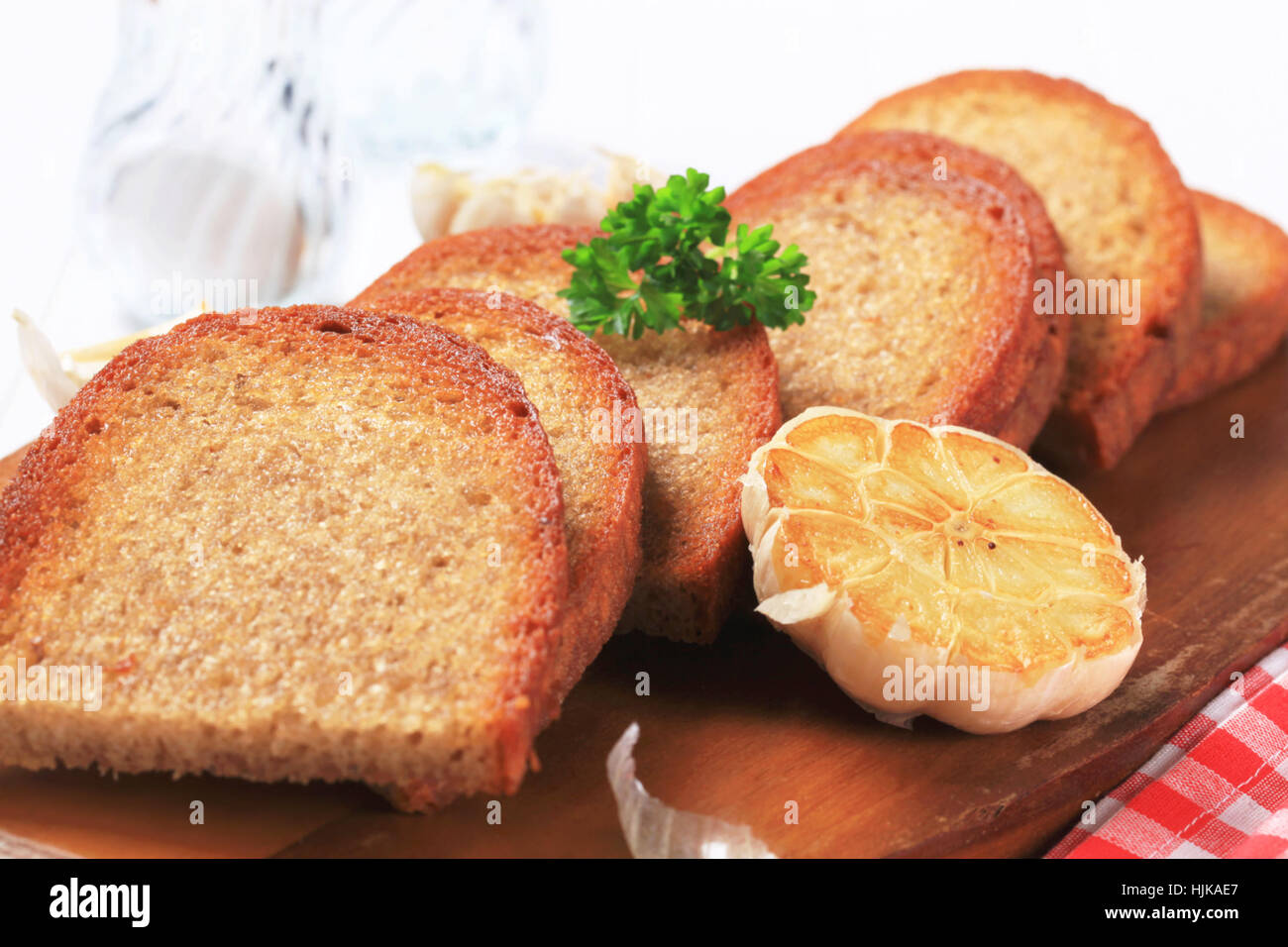 Slices of pan fried bread with garlic Stock Photo - Alamy