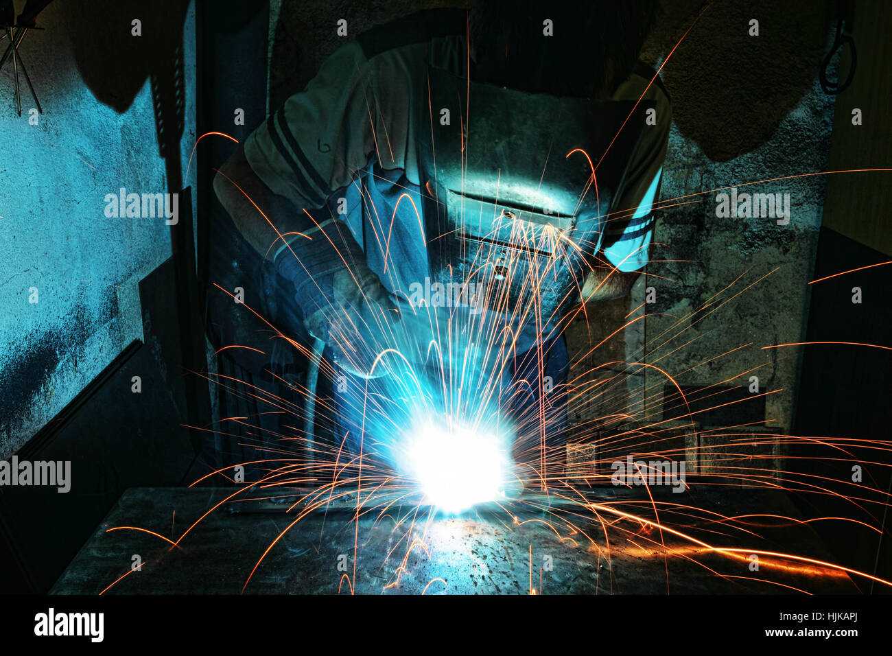 Industrial Worker at the factory welding closeup Stock Photo - Alamy