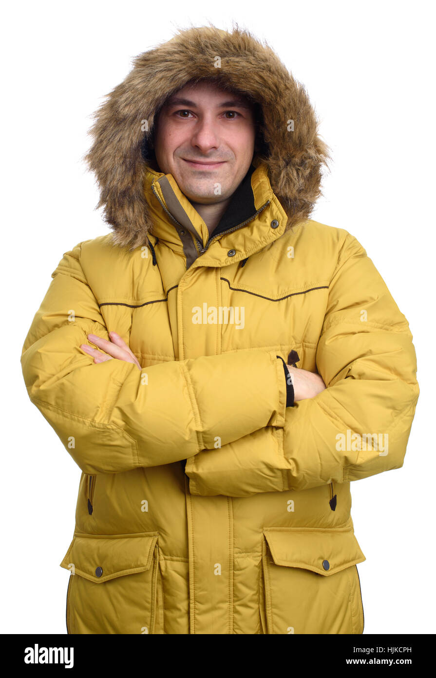 portrait of smiling man in winter coat. isolated on white background ...