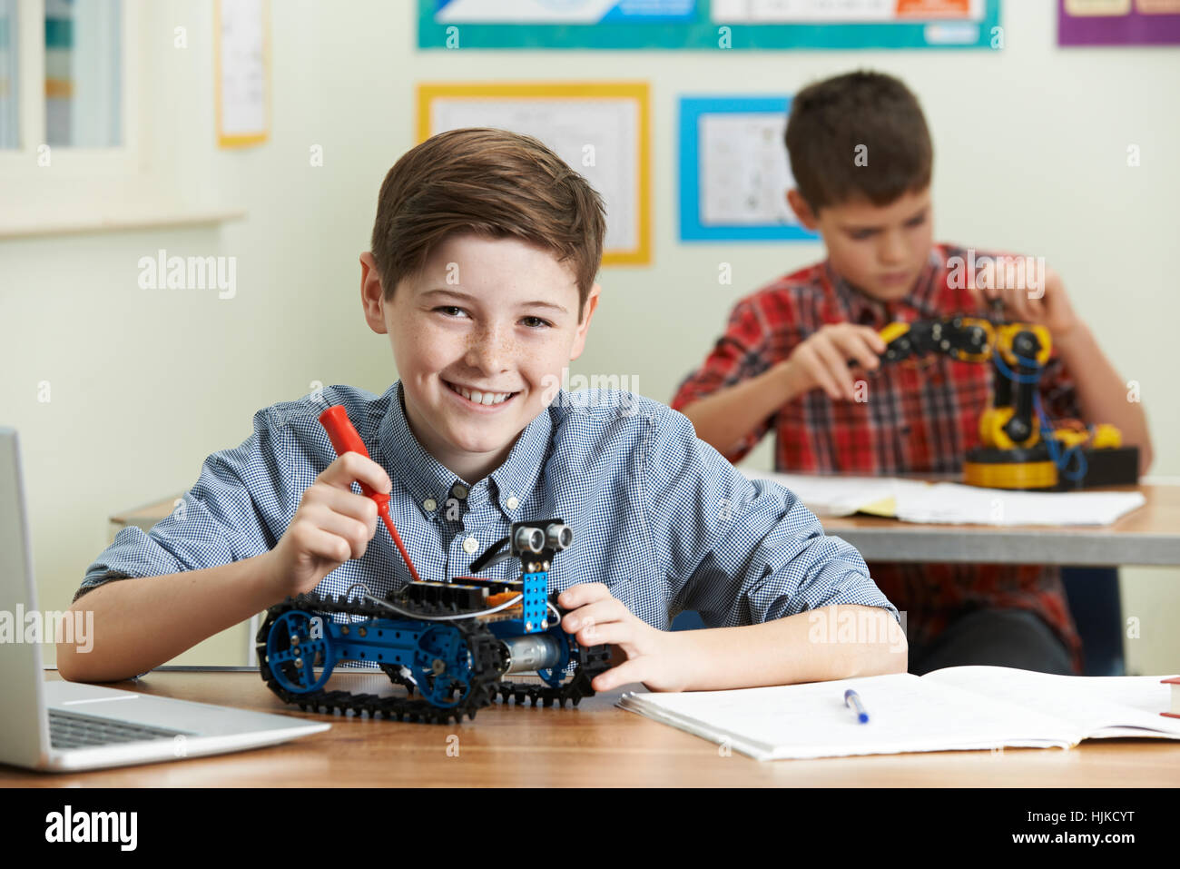 Two Male Pupils In Science Lesson Studying Robotics Stock Photo - Alamy