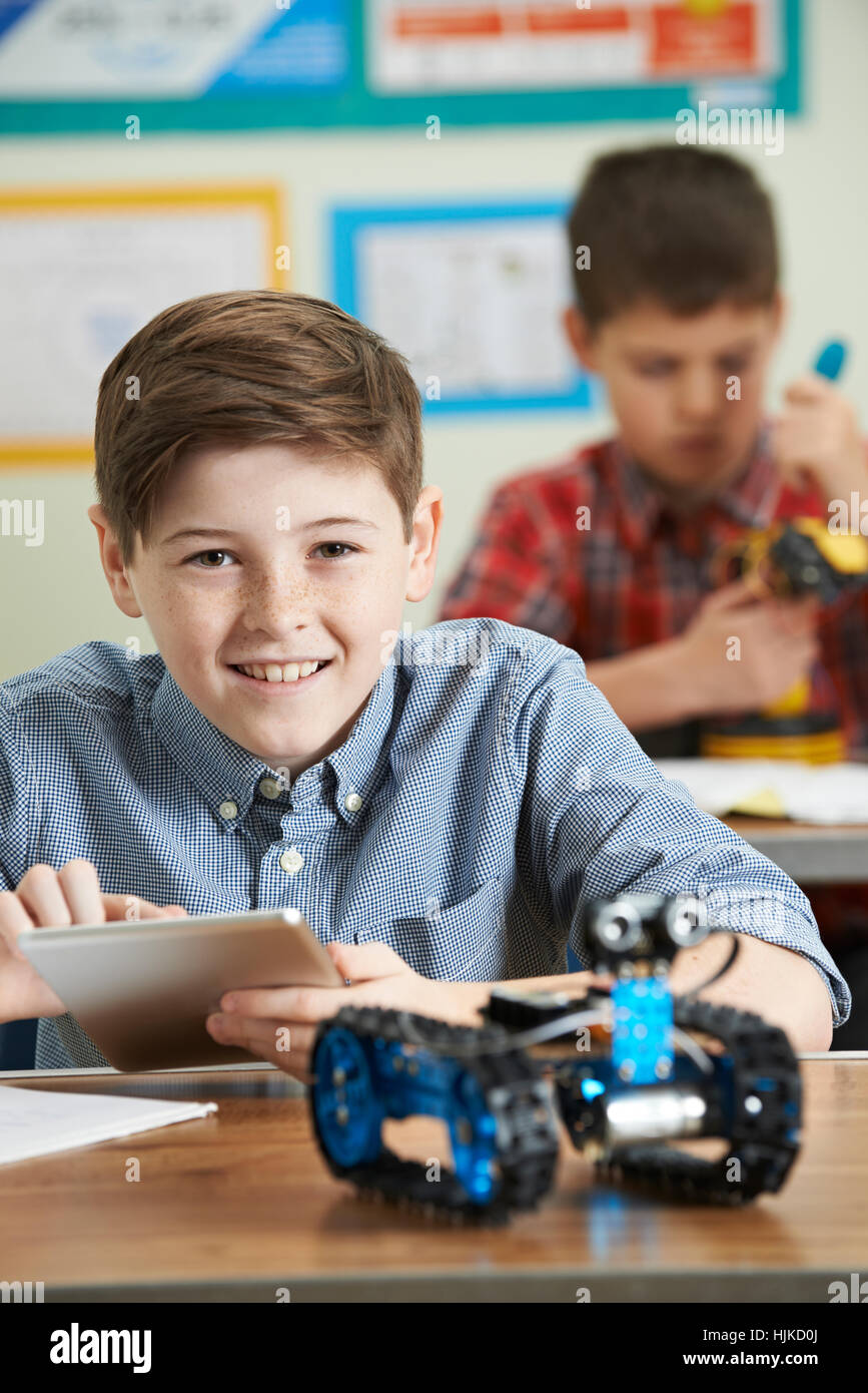 Two Male Pupils In Science Lesson Studying Robotics Stock Photo - Alamy