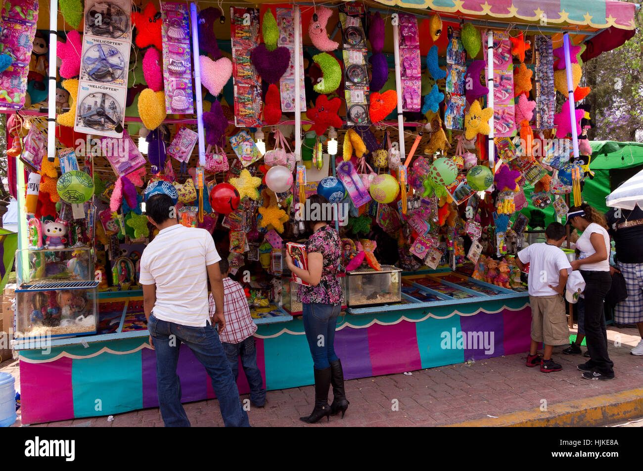Visitors at a Mexican fair stand Stock Photo - Alamy