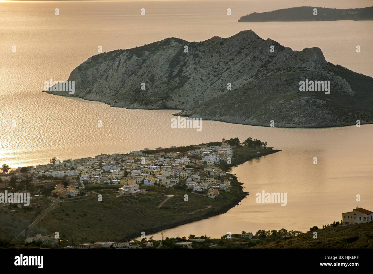 Sunset at Perdika village and Moni islet in the Aegina island located ...