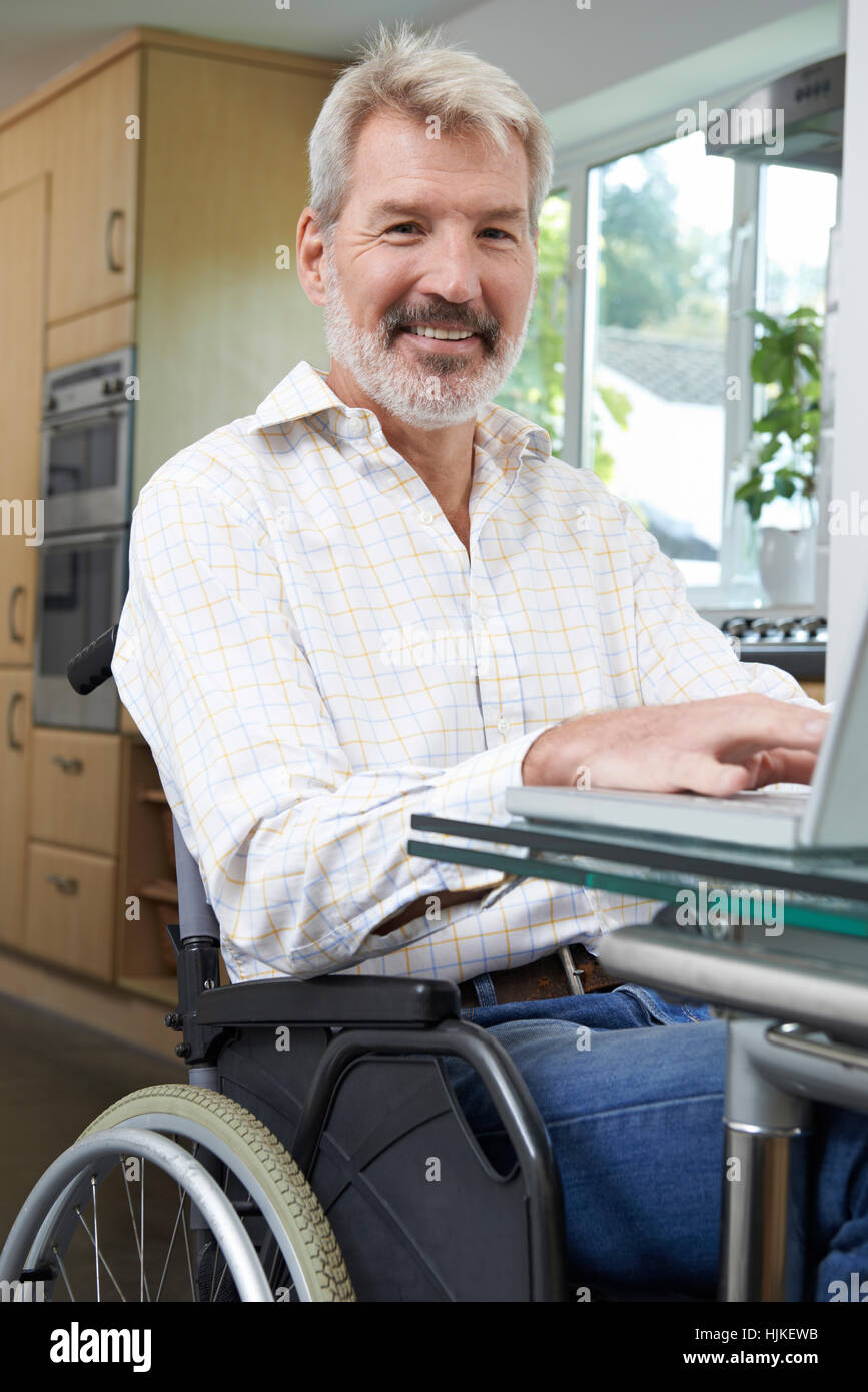 Wheelchair man computer hi-res stock photography and images - Alamy