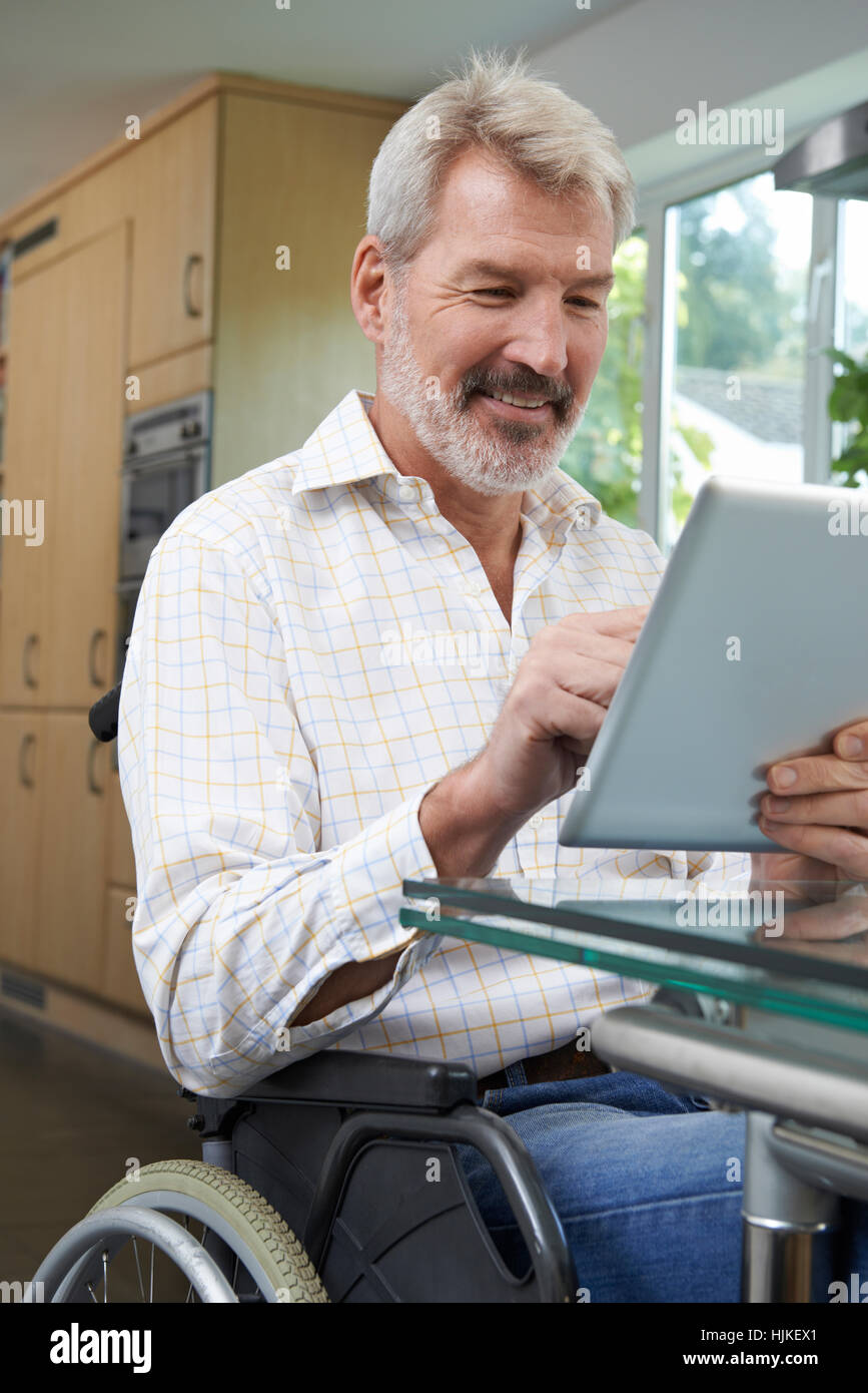 Disabled man wheelchair hi-res stock photography and images - Alamy