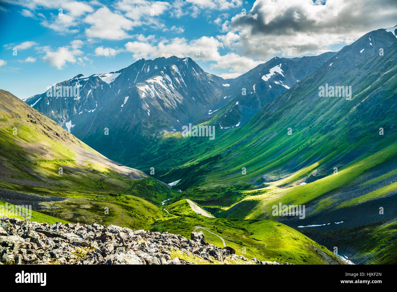 A view of the mountains and valleys from Crow Pass hiking trail in ...