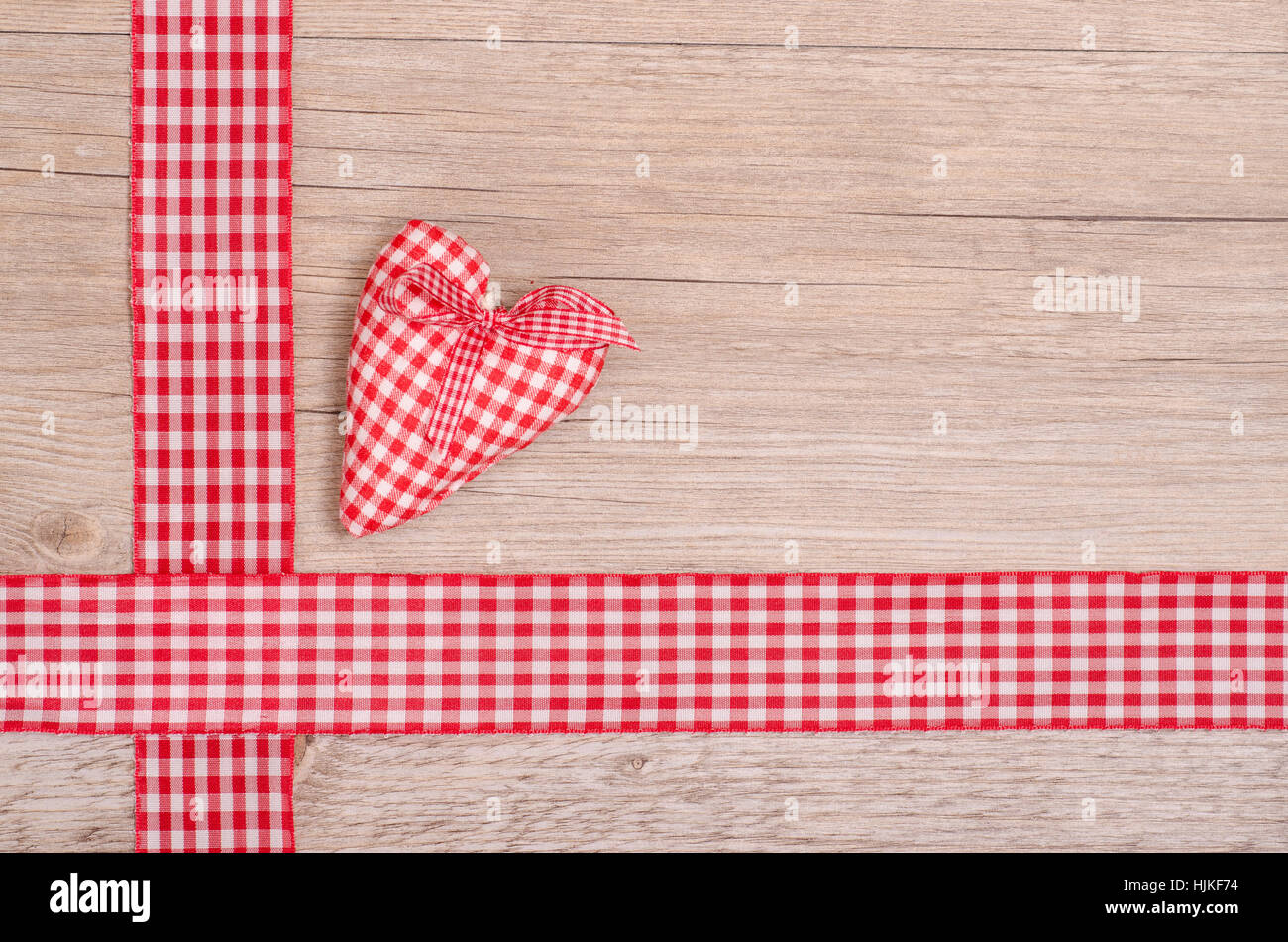 red checkered heart and ribbon as a background Stock Photo - Alamy