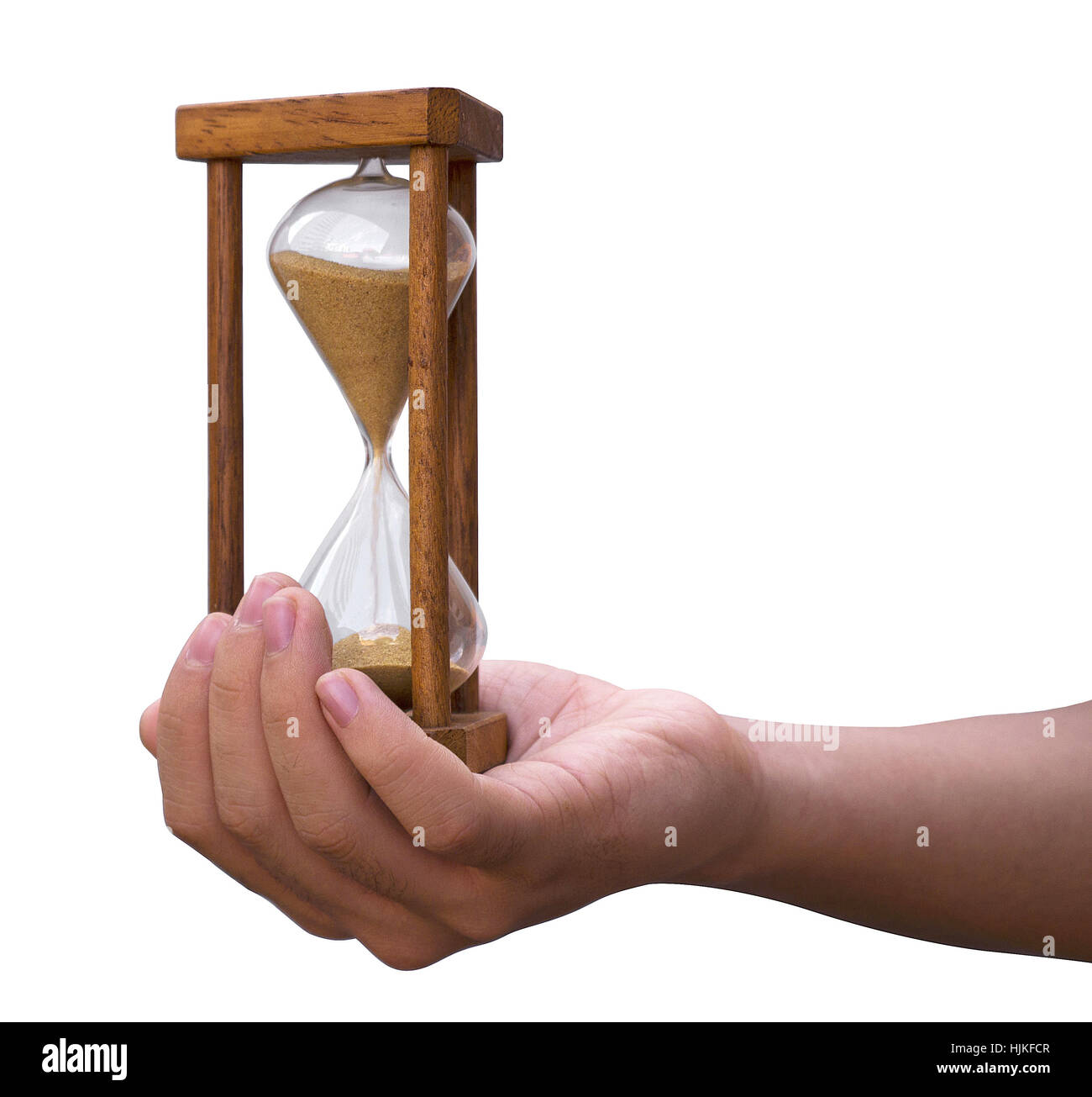 Hourglass on hand Stock Photo - Alamy