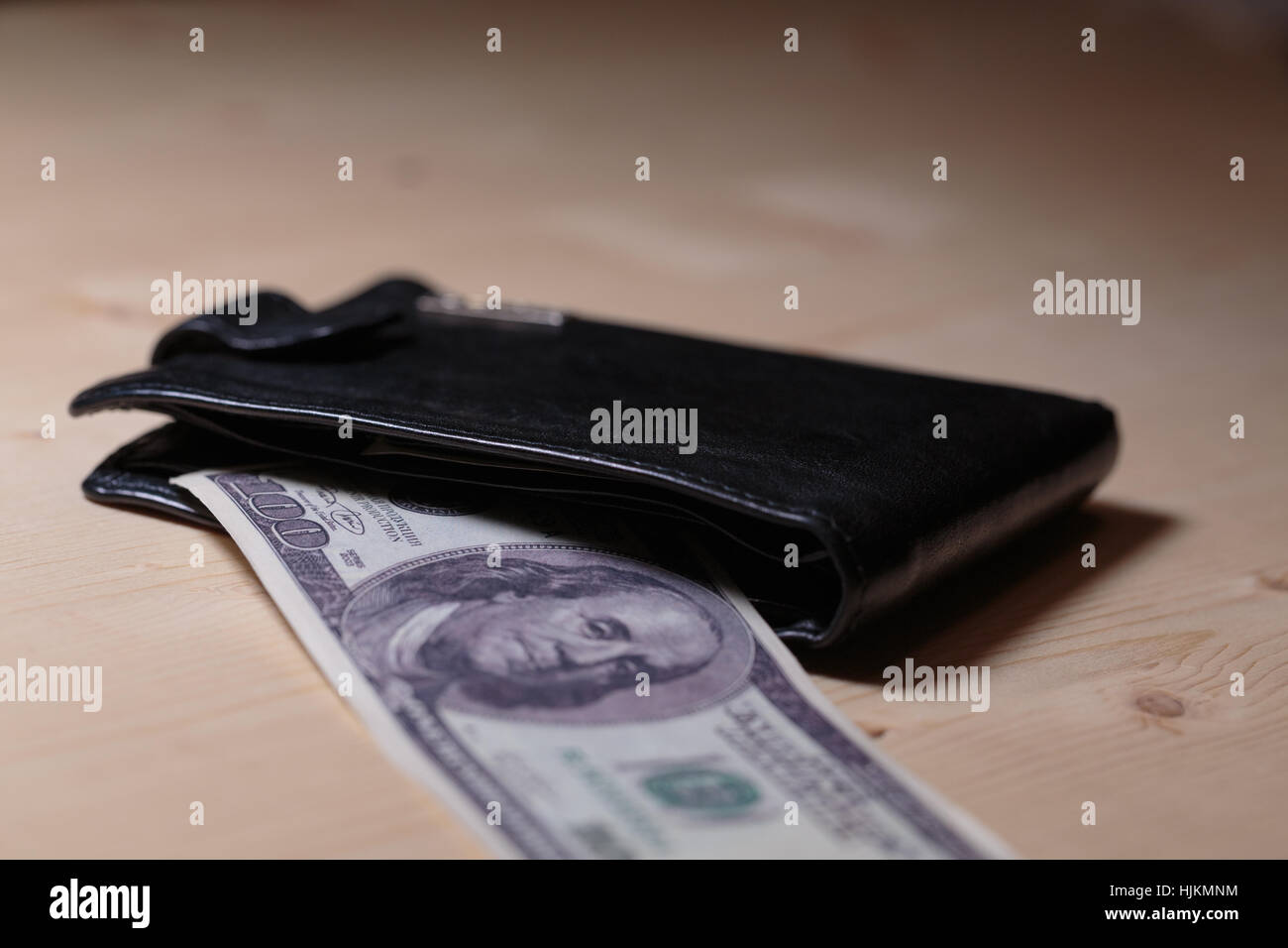Money comes in a purse Stock Photo - Alamy