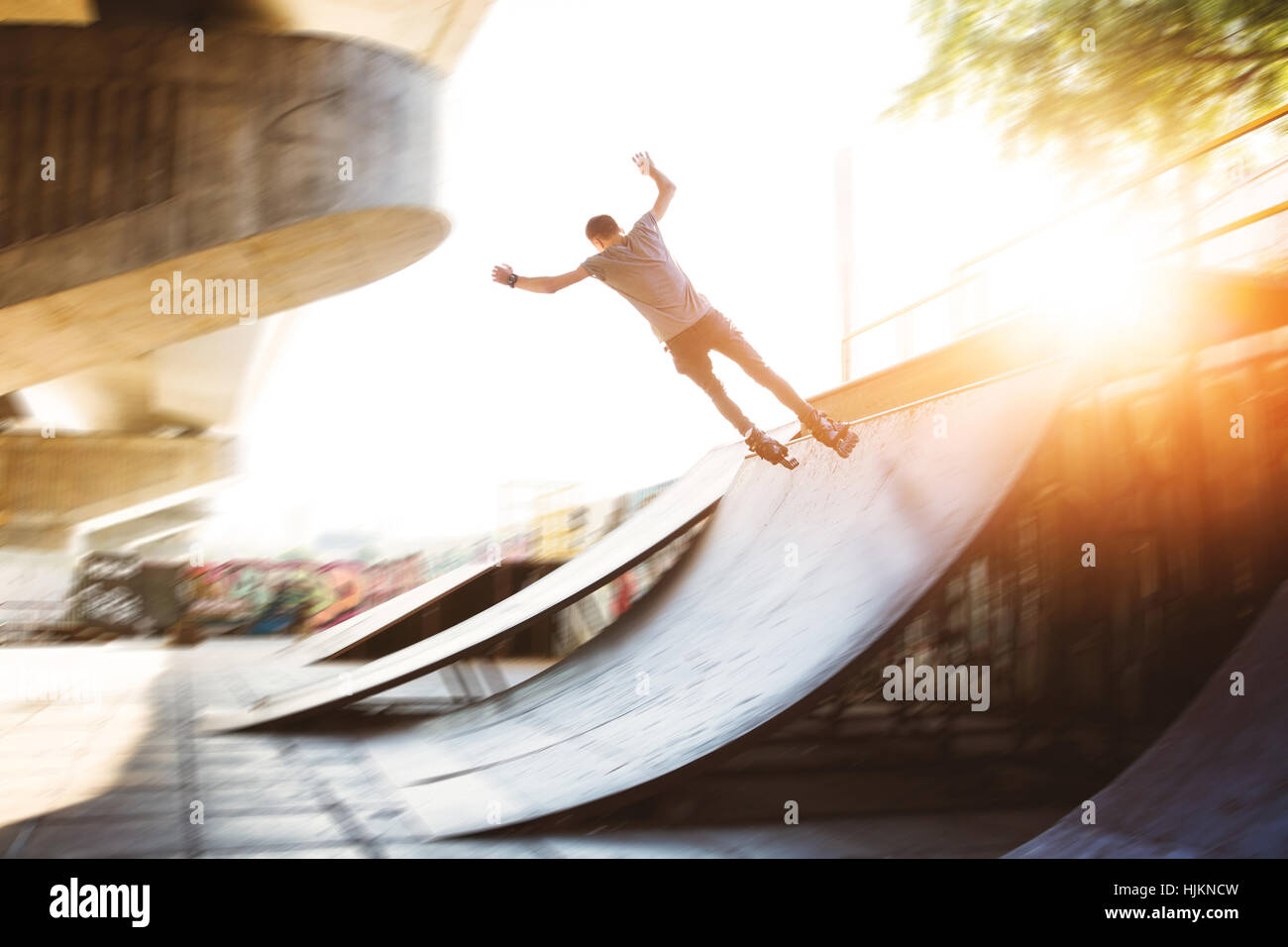 Guy rollerblading outdoors Stock Photo - Alamy