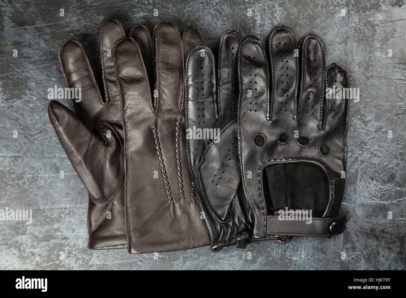 Two pairs of leather gloves Stock Photo - Alamy