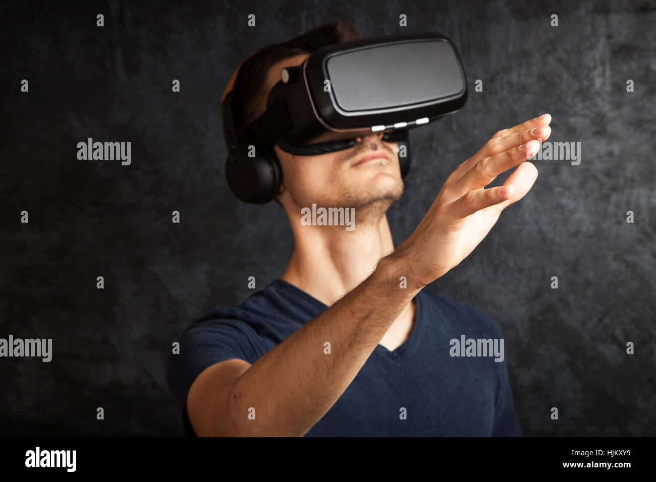 Man using VR goggles Stock Photo - Alamy