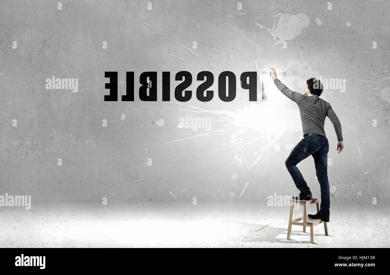 Businessman erasing impossible word hi-res stock photography and images ...