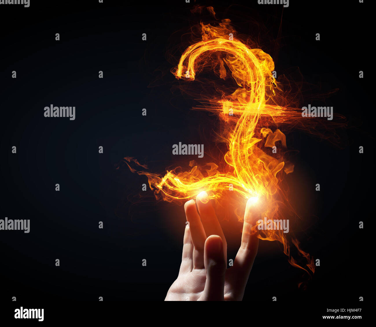 Burning pound sign in businessman palm on dark background Stock Photo ...