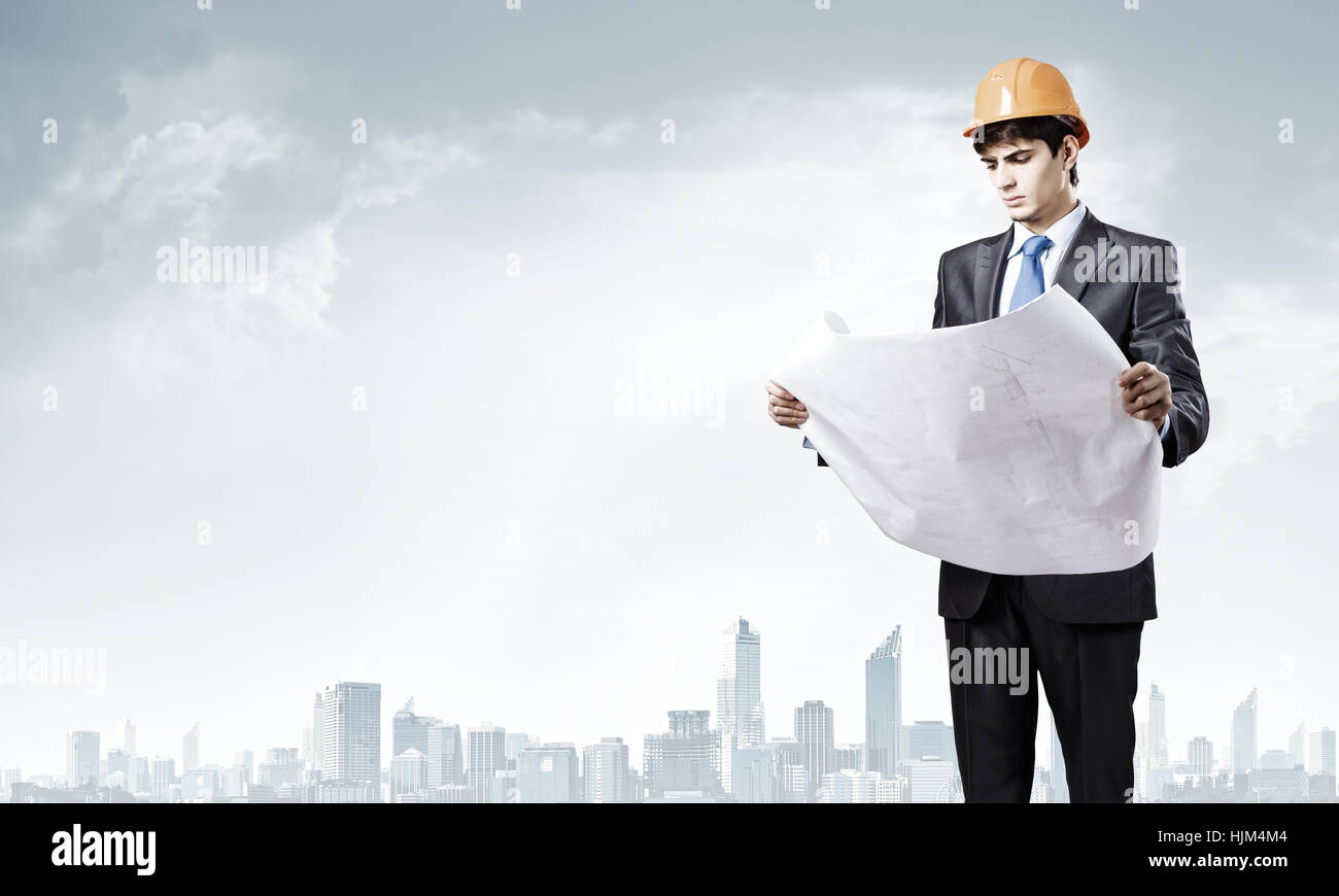 Construction worker examining house hi-res stock photography and images ...