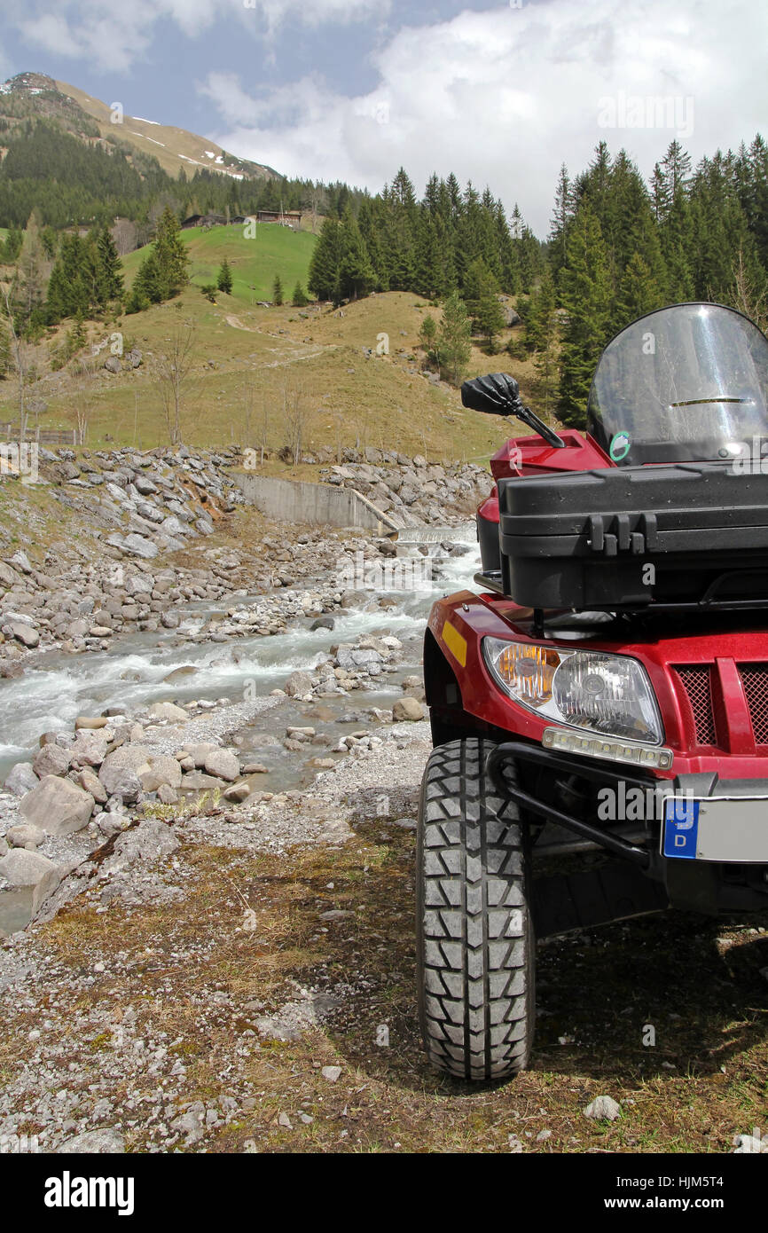 with the atv on mountain Stock Photo - Alamy