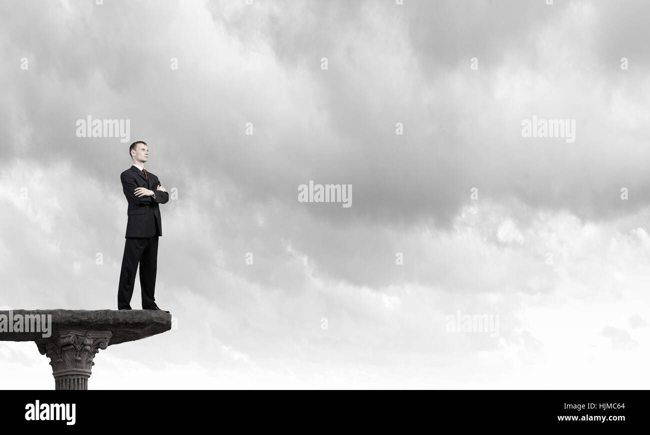 Ceo standing arms crossed hi-res stock photography and images - Alamy