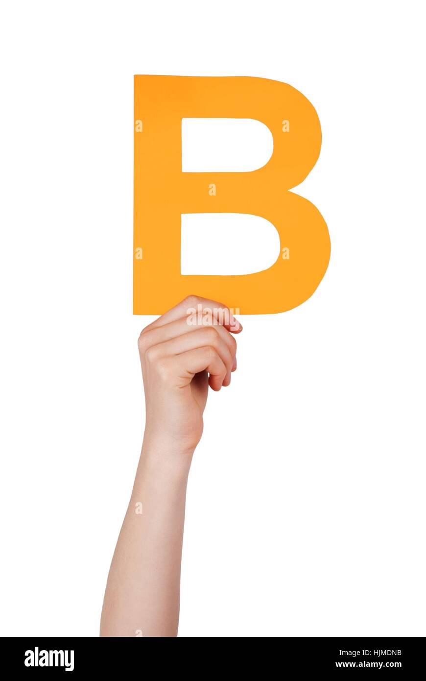 the letter B, hold by a hand, isolated Stock Photo - Alamy
