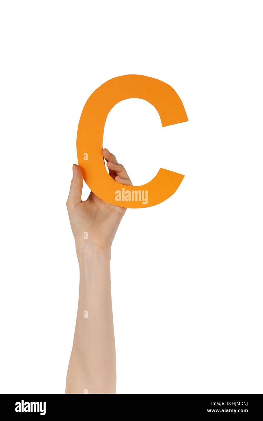 the letter c, hold by a hands, isolated Stock Photo - Alamy