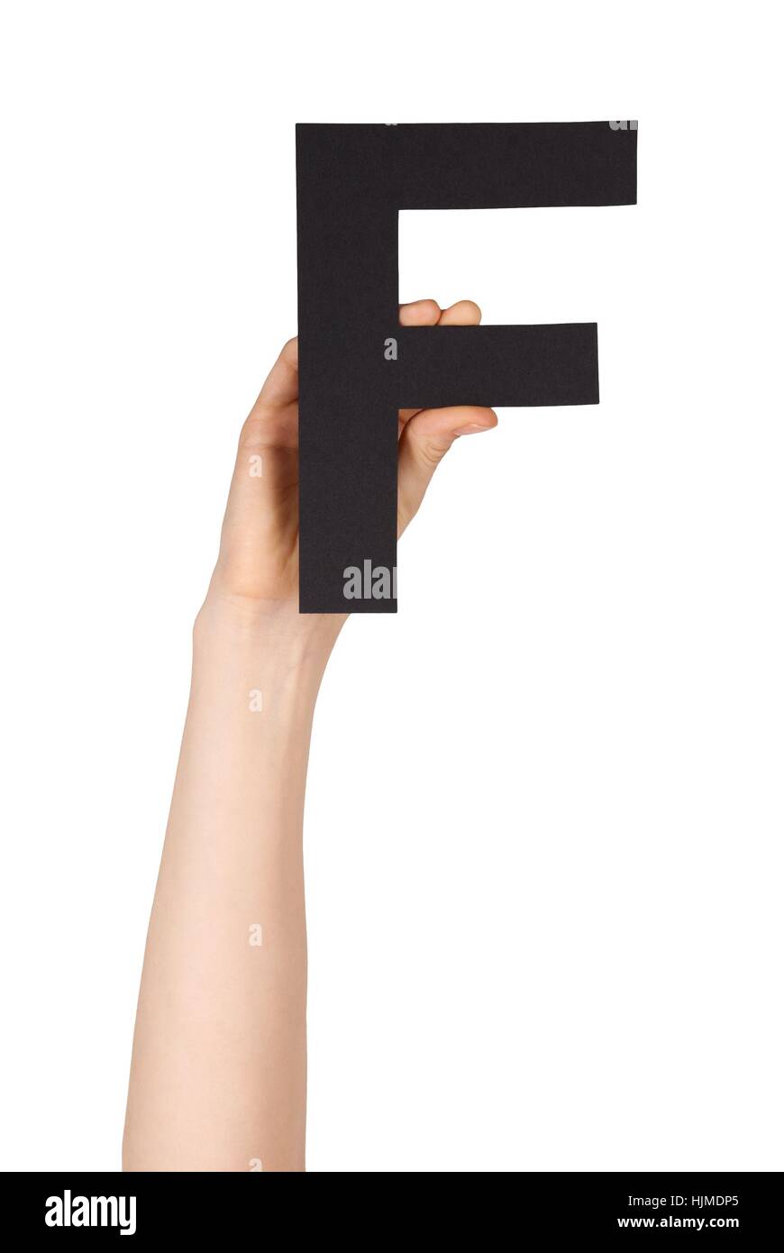 the letter F, hold by a hand, isolated Stock Photo - Alamy